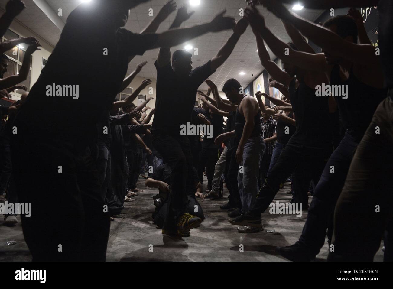 MANAMA, BAHRAIN - JULY 17, 2014 - Shiite Muslims perform dance ritual ...