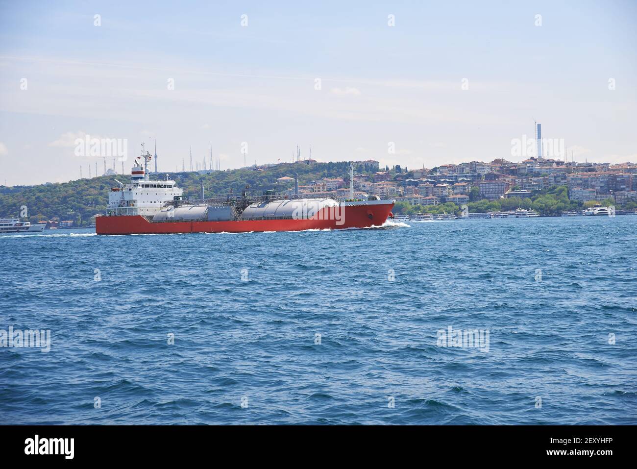 A large blue cargo ship with containers. Bosphorus, Istanbul, Turkey ...