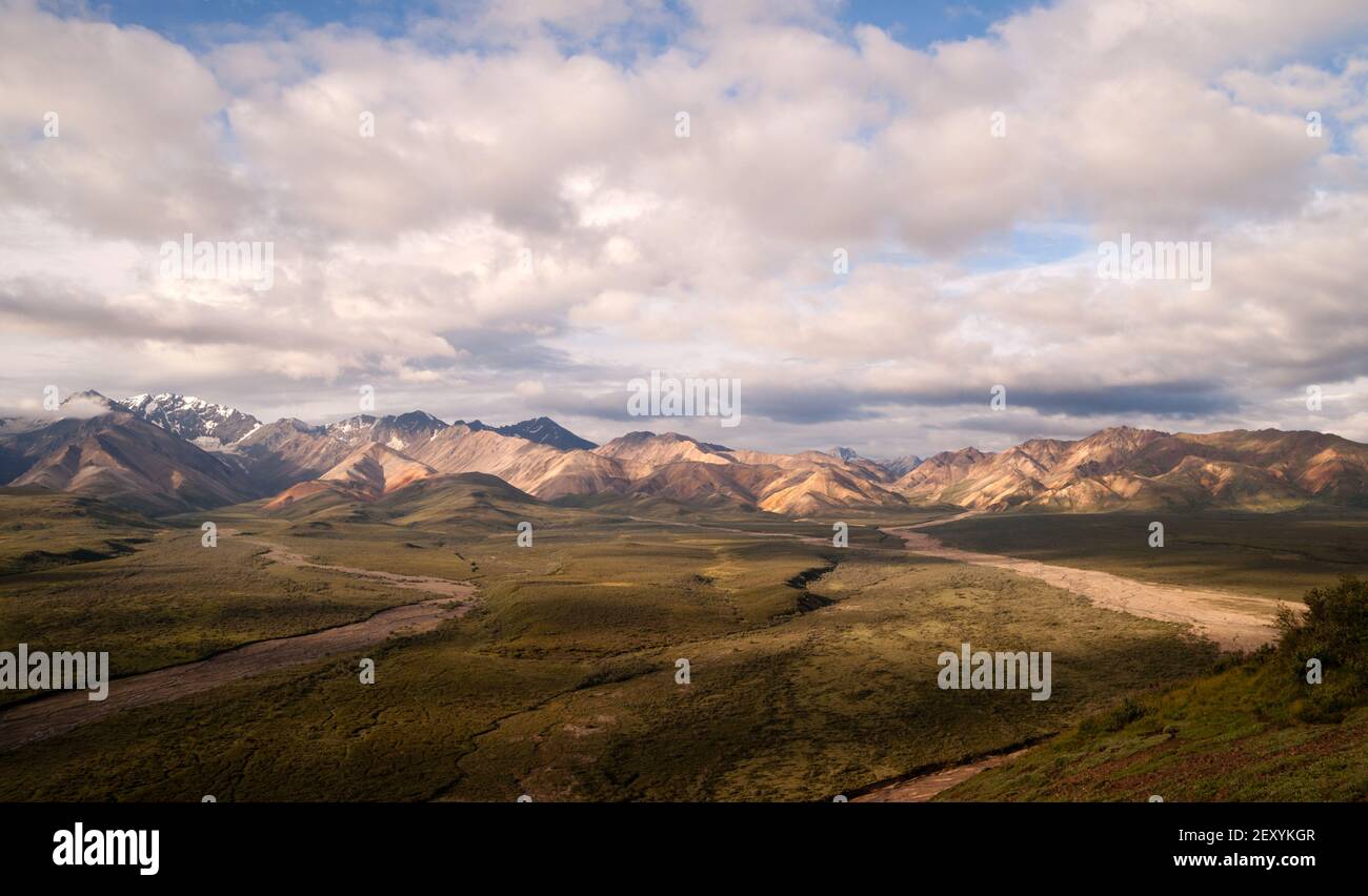 Puffy clouds blue sky Alaska Range Denali National Park Stock Photo - Alamy