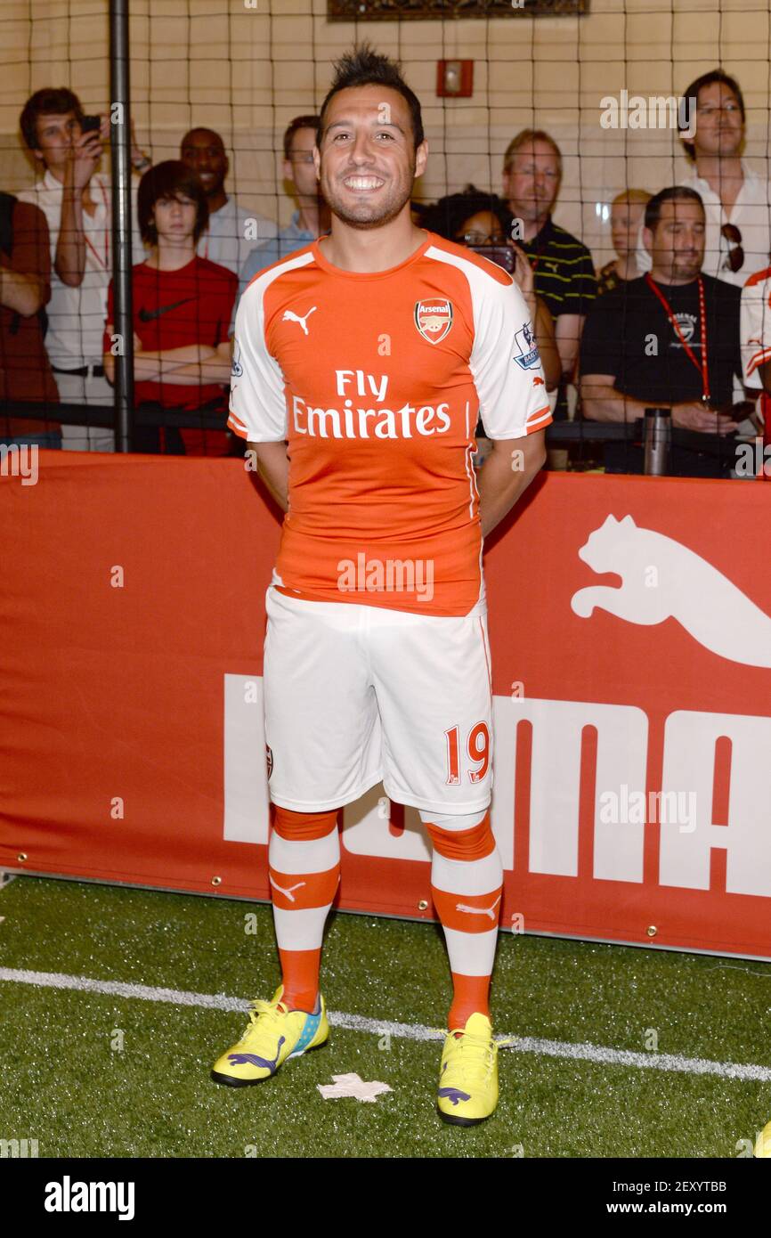 Arsenal soccer player Santi Cazorla, from Spain, poses in new uniform ...