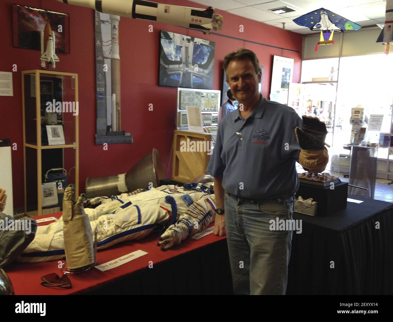 Ken Winans, founder of the Space Station Museum in Novato, Calif., dons ...