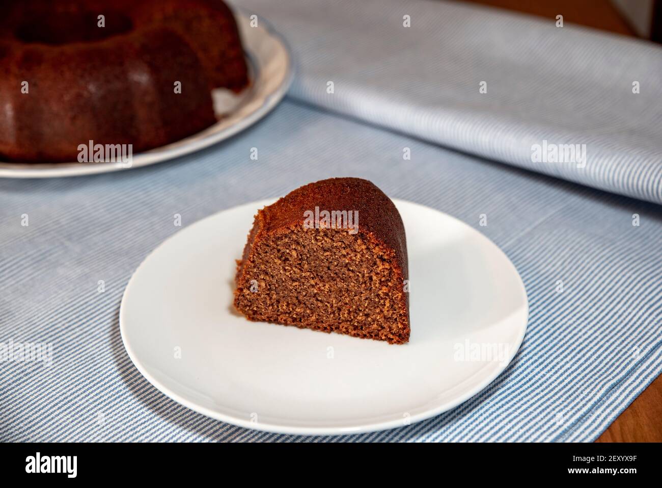 a portion of delicious chocolate sponge cake in the shape of a wreath ...