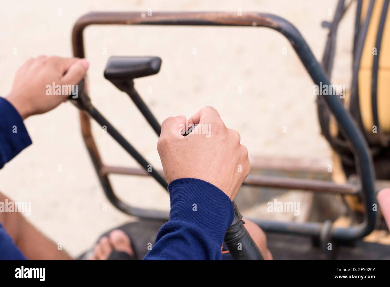 A man hand is controlling a backhoe, building contractor Stock Photo ...