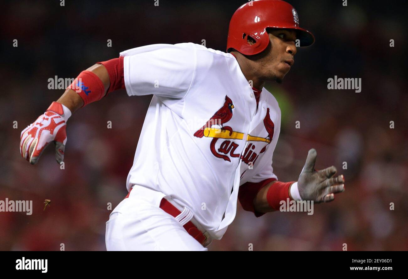 The St. Louis Cardinals' Oscar Taveras legs out a double in the fourth ...