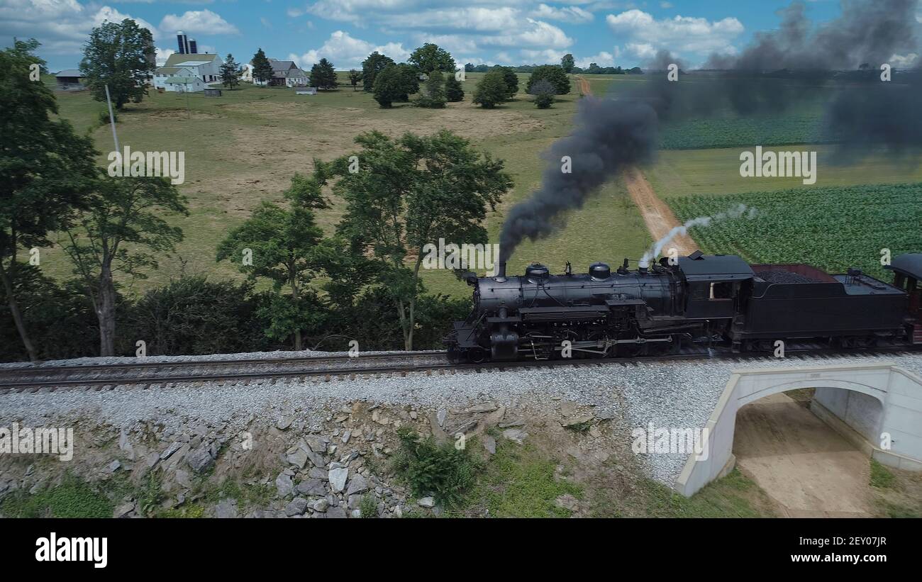 Aerial View of An Antique Restored Steam Locomotive Blowing Smoke and ...