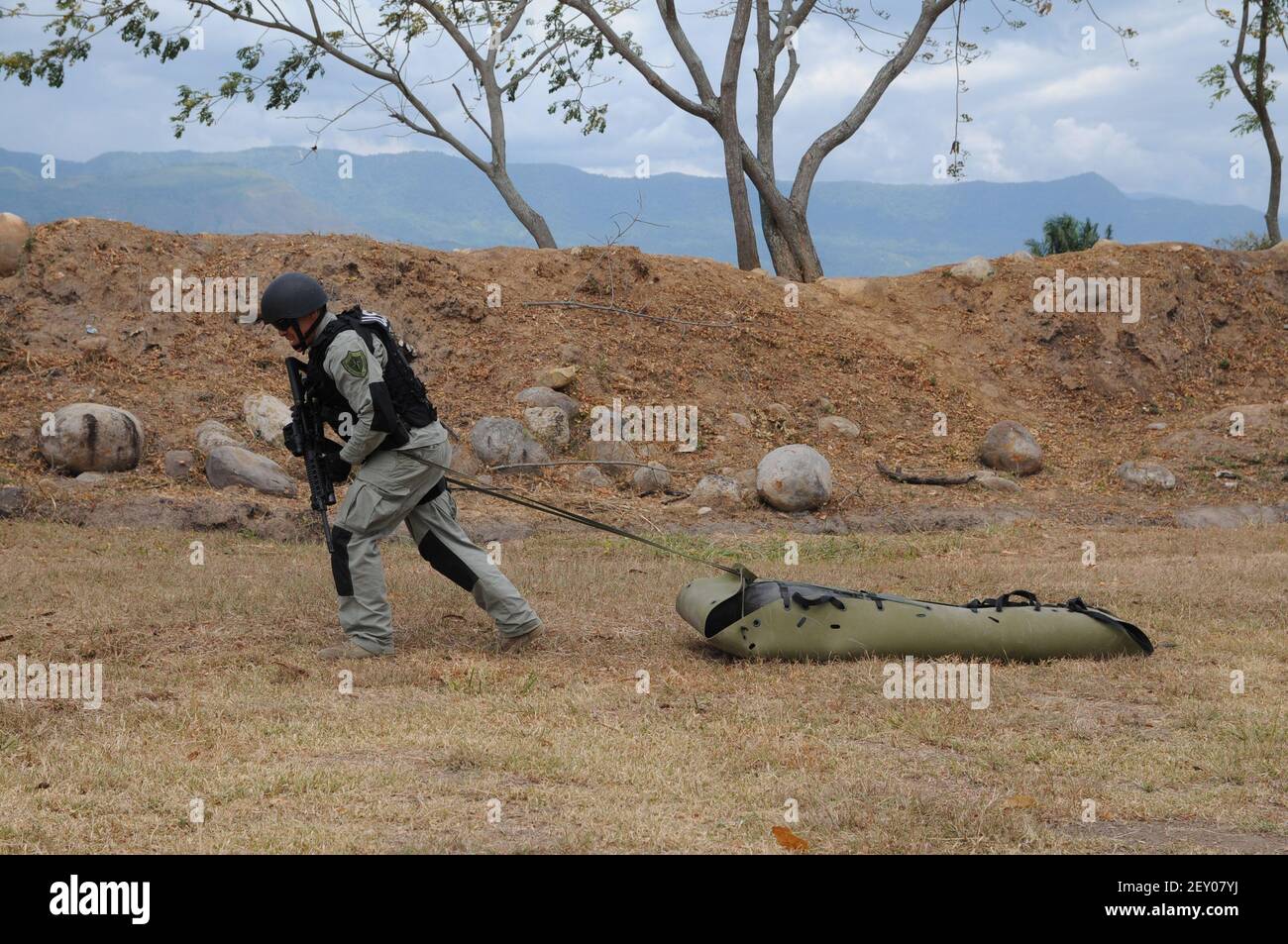 A Costa Rican special operations forces team member pulls an evacuation ...