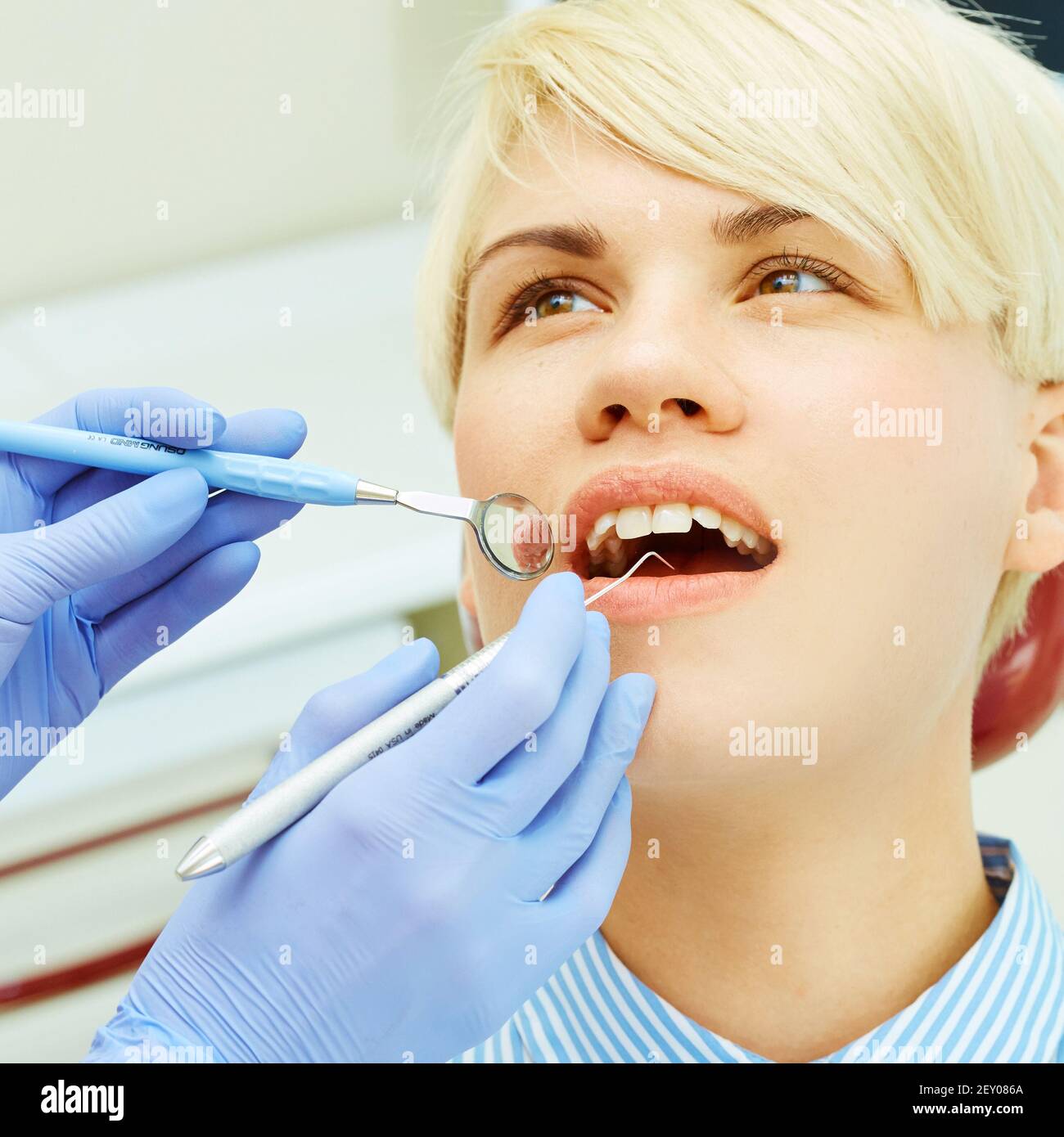 Examining tool hi-res stock photography and images - Alamy