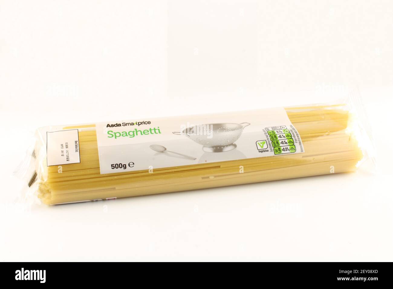 Packets of dried spaghetti isolated on a white background with copy ...