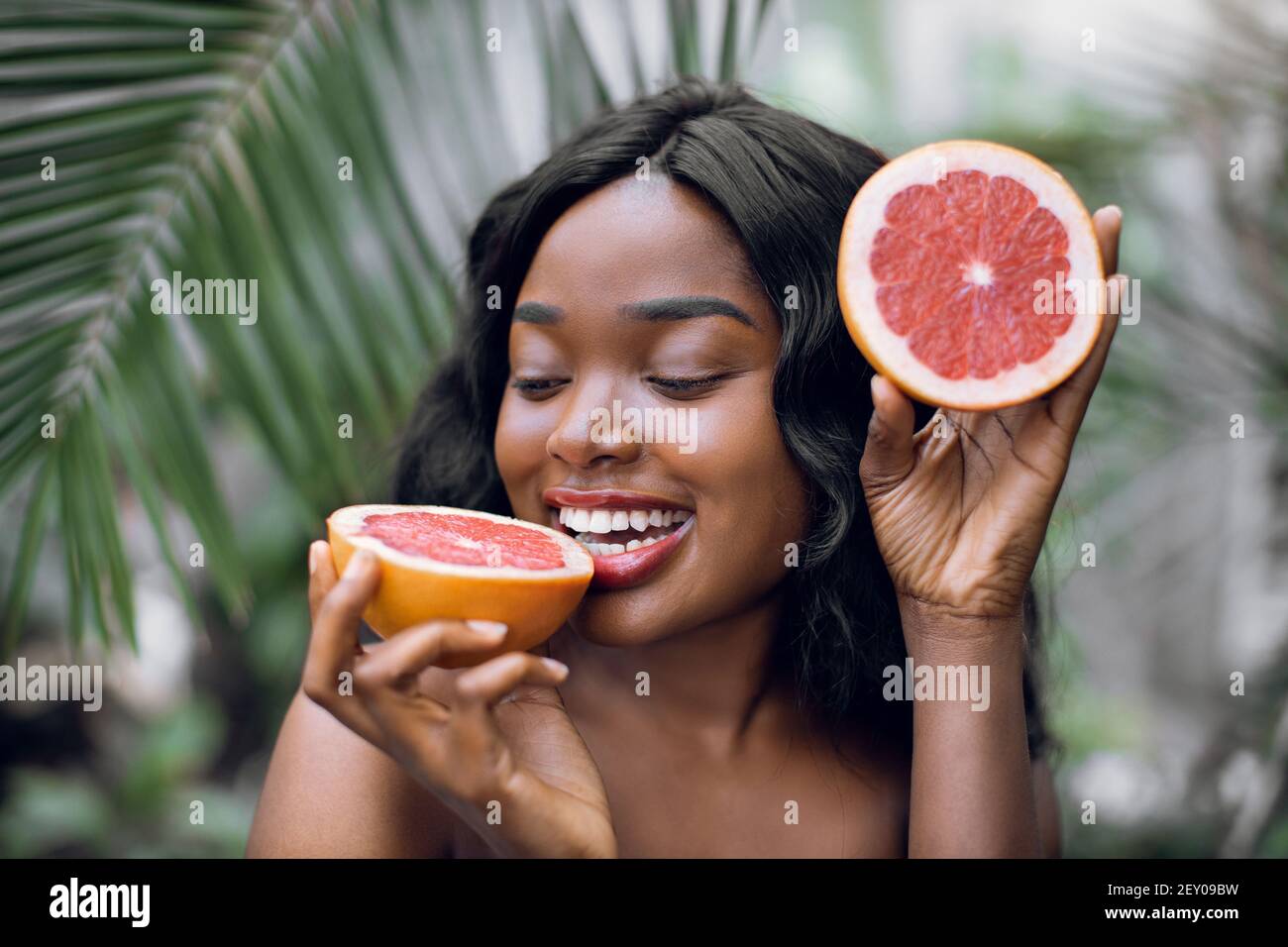 Biting fruit tree hi-res stock photography and images - Alamy