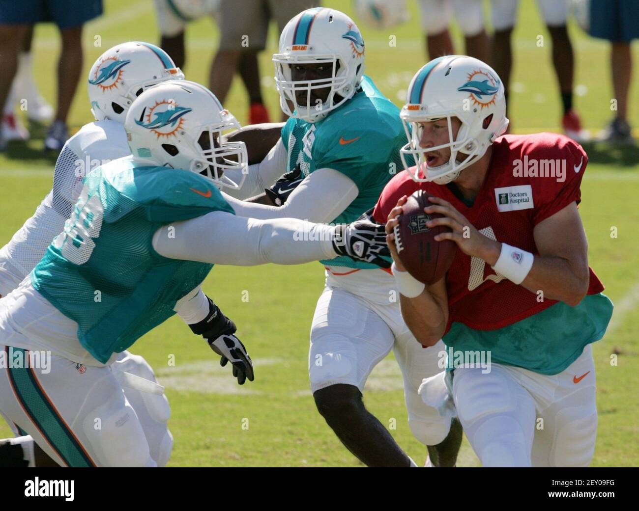 Quarterback Seth Lobato (4) looks to throw the ball during a drill on ...