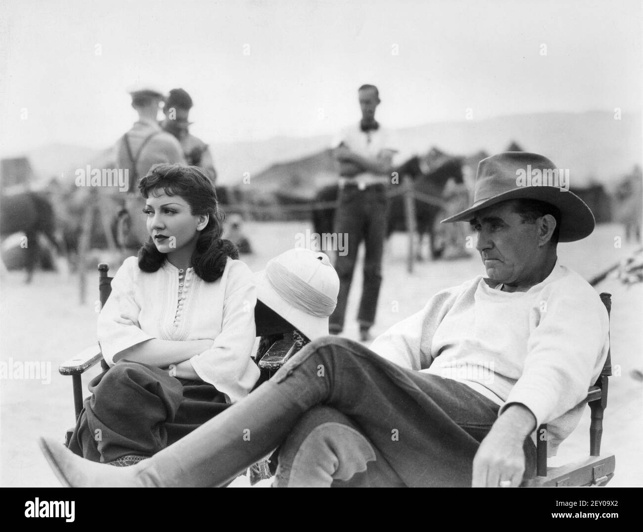CLAUDETTE COLBERT and Director FRANK LLOYD on set location candid ...