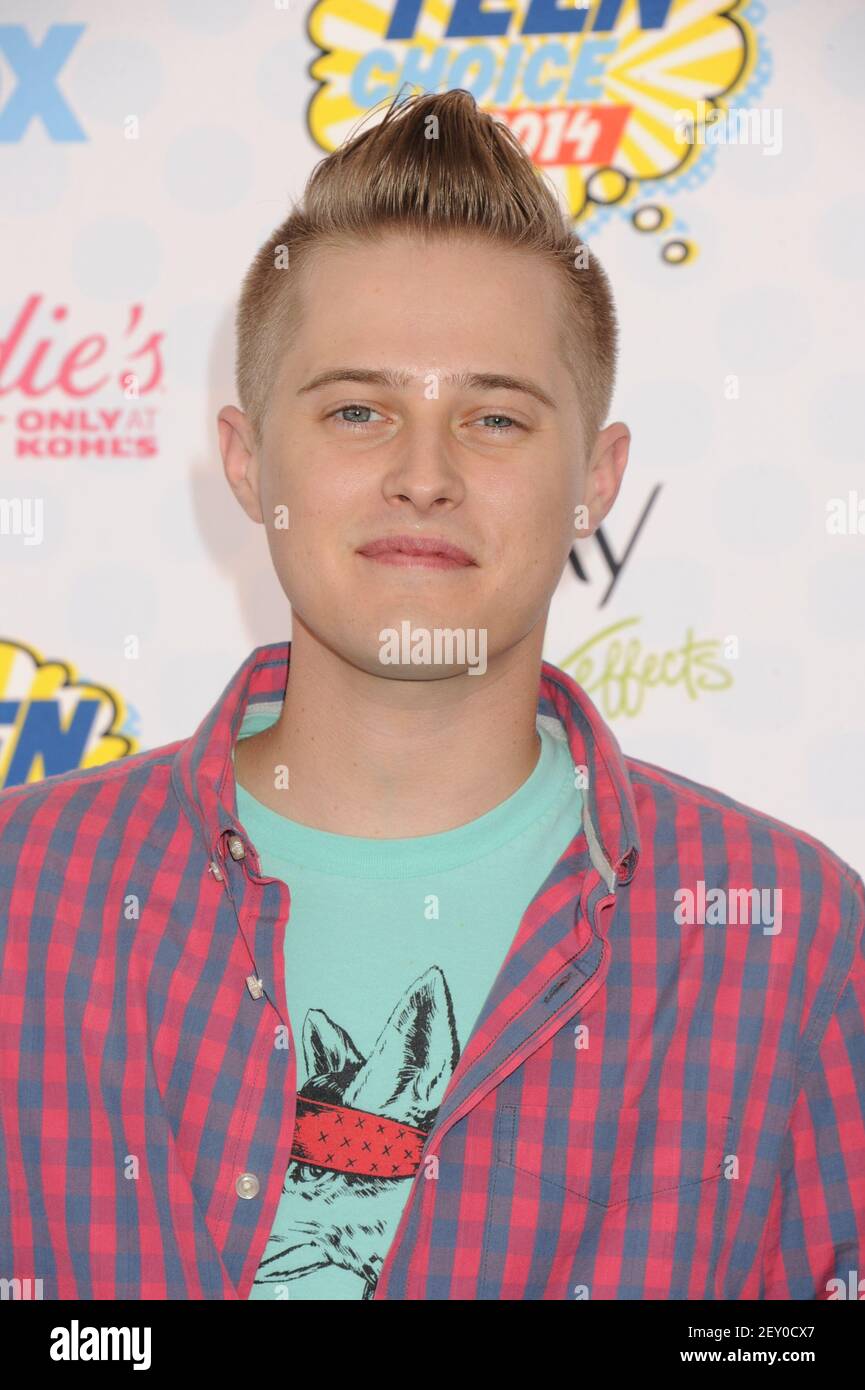Lucas Grabeel arrives to the 2014 Teen Choice Awards, held at the ...