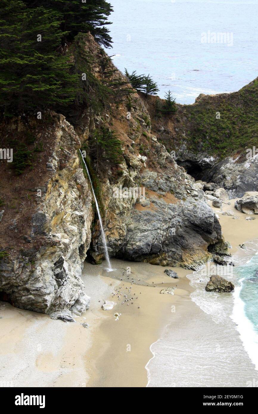 McWay Falls tumbles 80 feet to a sandy beach along the Pacific Ocean at ...