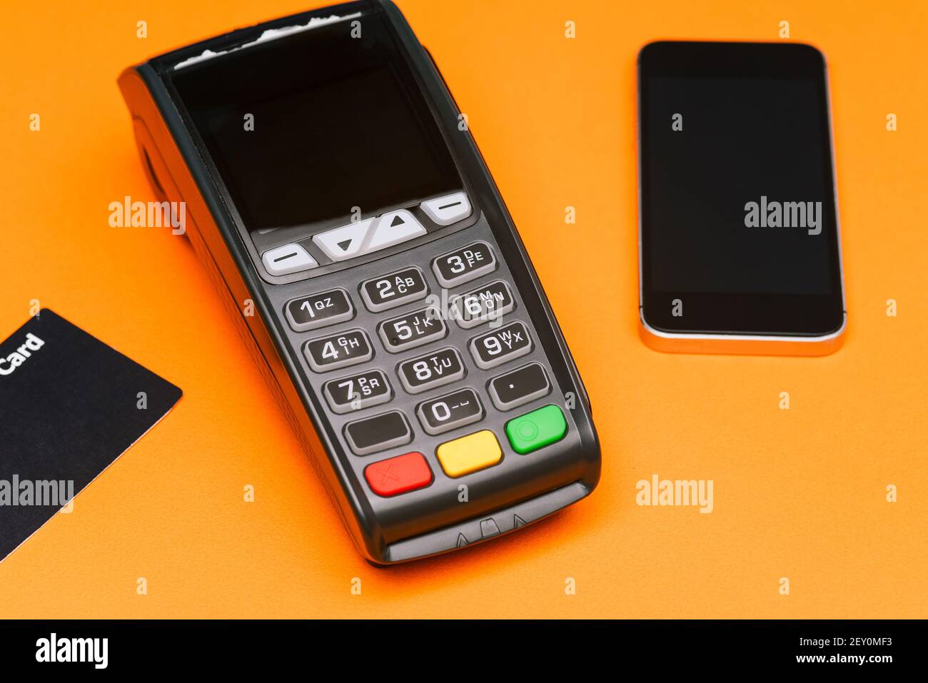 Pay for purchases with a mobile phone or credit card using a POS ...