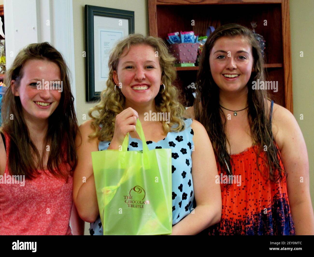 Katherine Roll, Sarah Warrick and Jackie Collet chuckle when making a ...