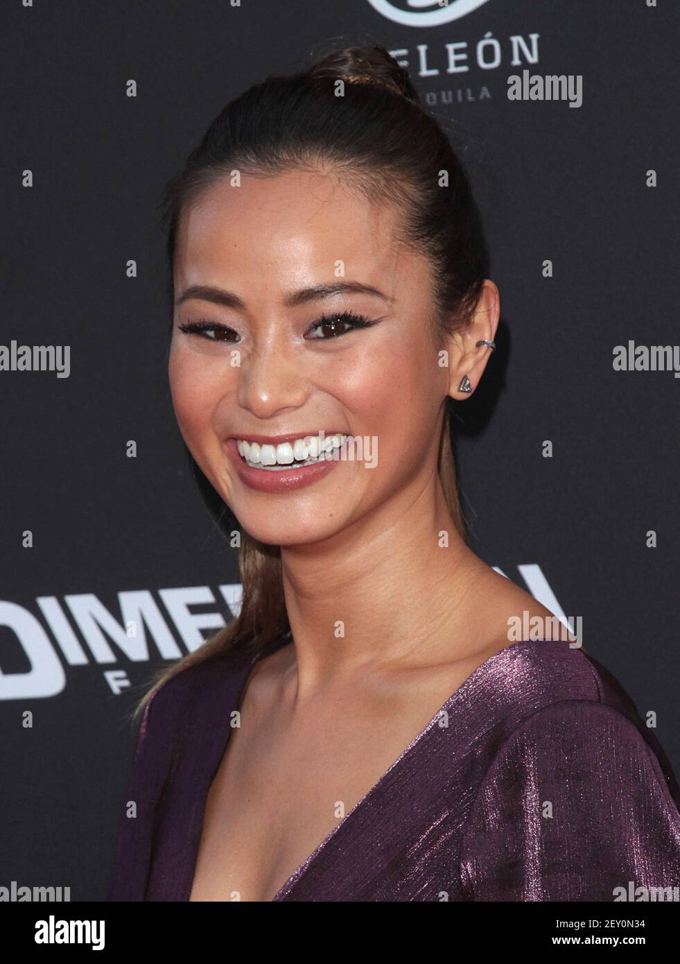 Jamie Chung attends The Los Angeles Premiere of "Sin City: A Dame to ...