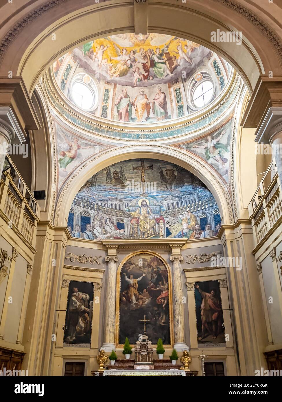 Group of frescoes decorating altar and dome interior of catholic church ...