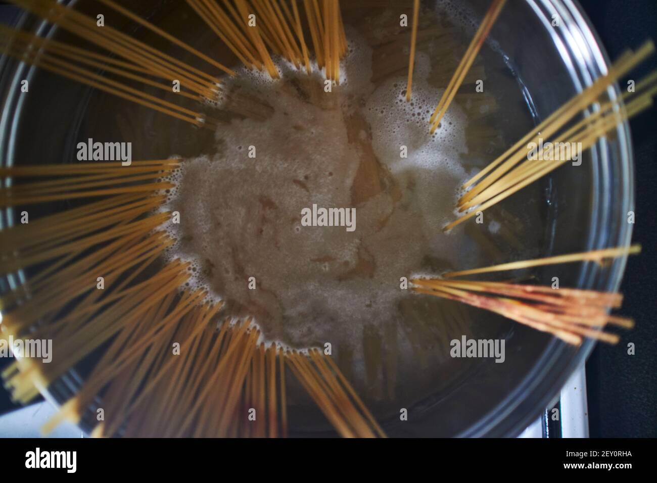 Cooking spaghetti in a pot Stock Photo - Alamy