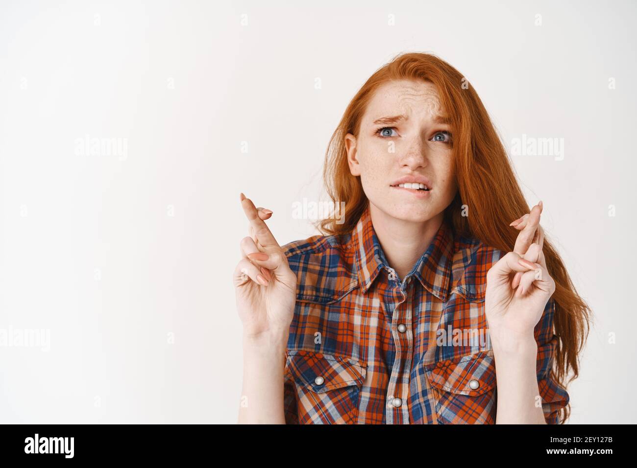 Woman biting lip happy hi-res stock photography and images - Alamy