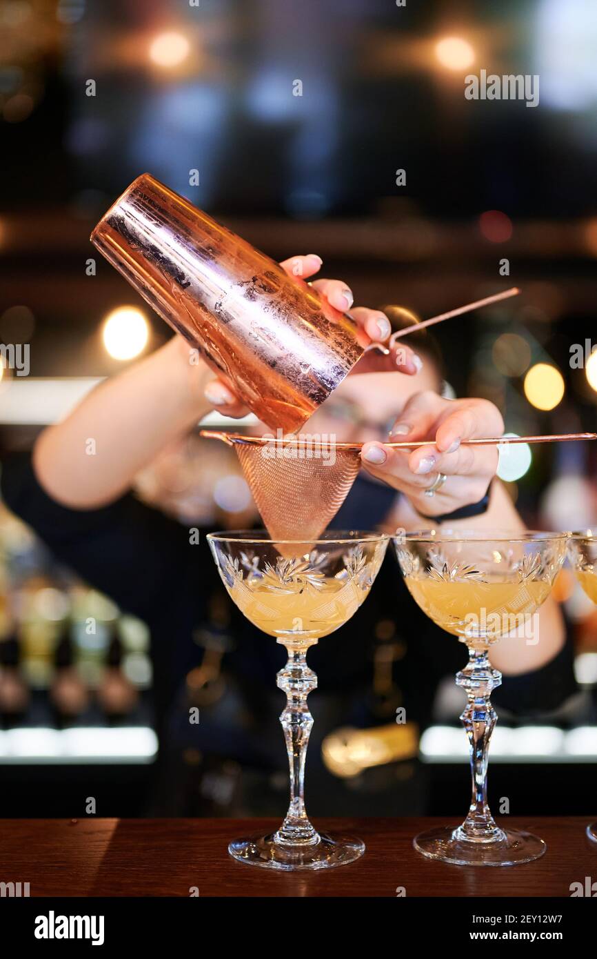 Waiter makes cocktail hi-res stock photography and images - Alamy