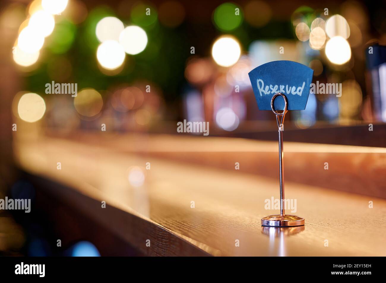 Plaque with the inscription reserved on the bar counter in the ...