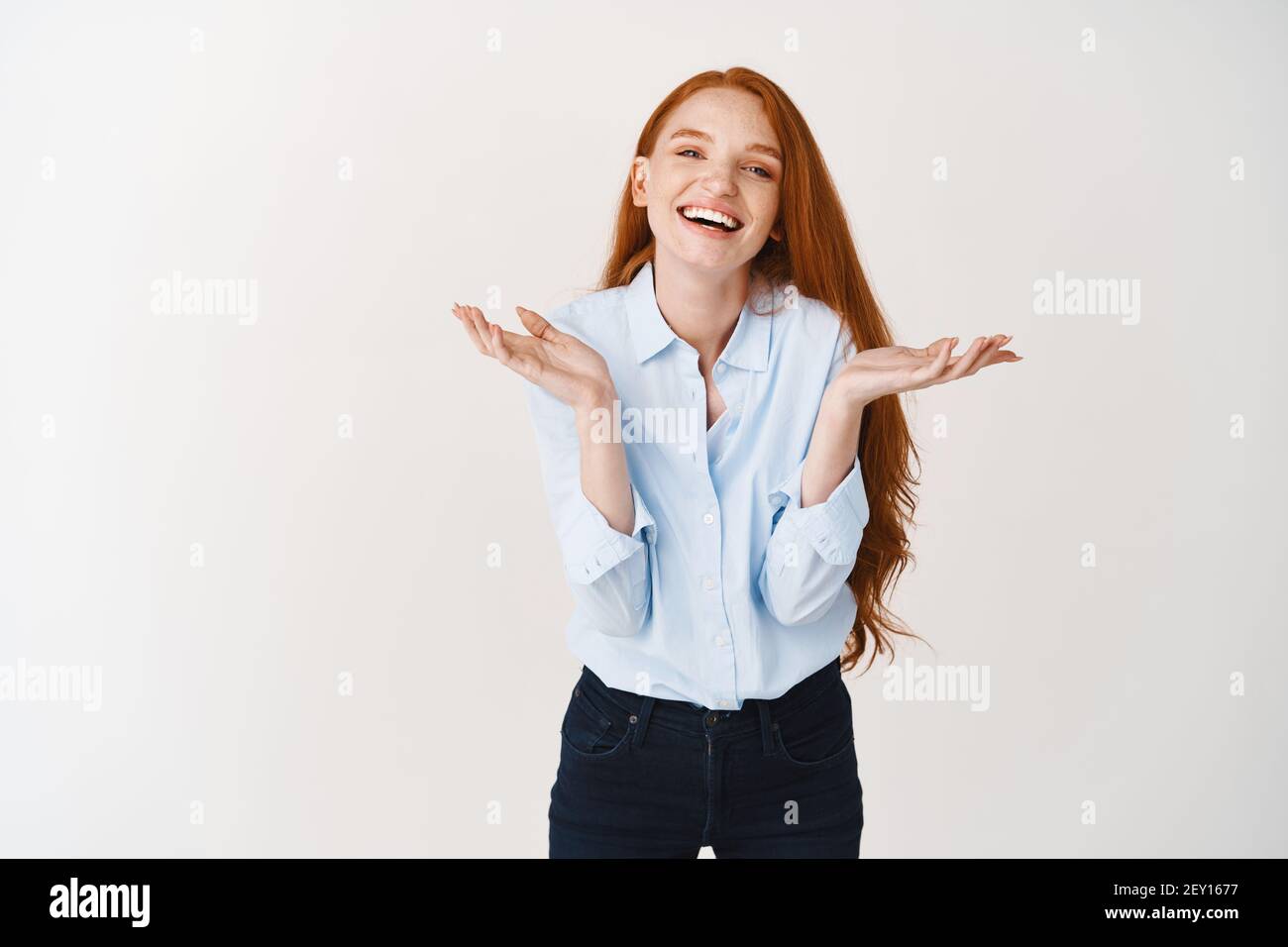 Image of beautiful young woman with natural red hair laughing, spread ...