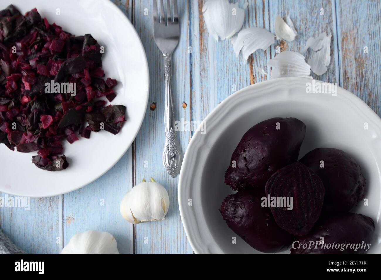 Flat lay of Cooked Beet greens and Roots plated dishes Stock Photo - Alamy