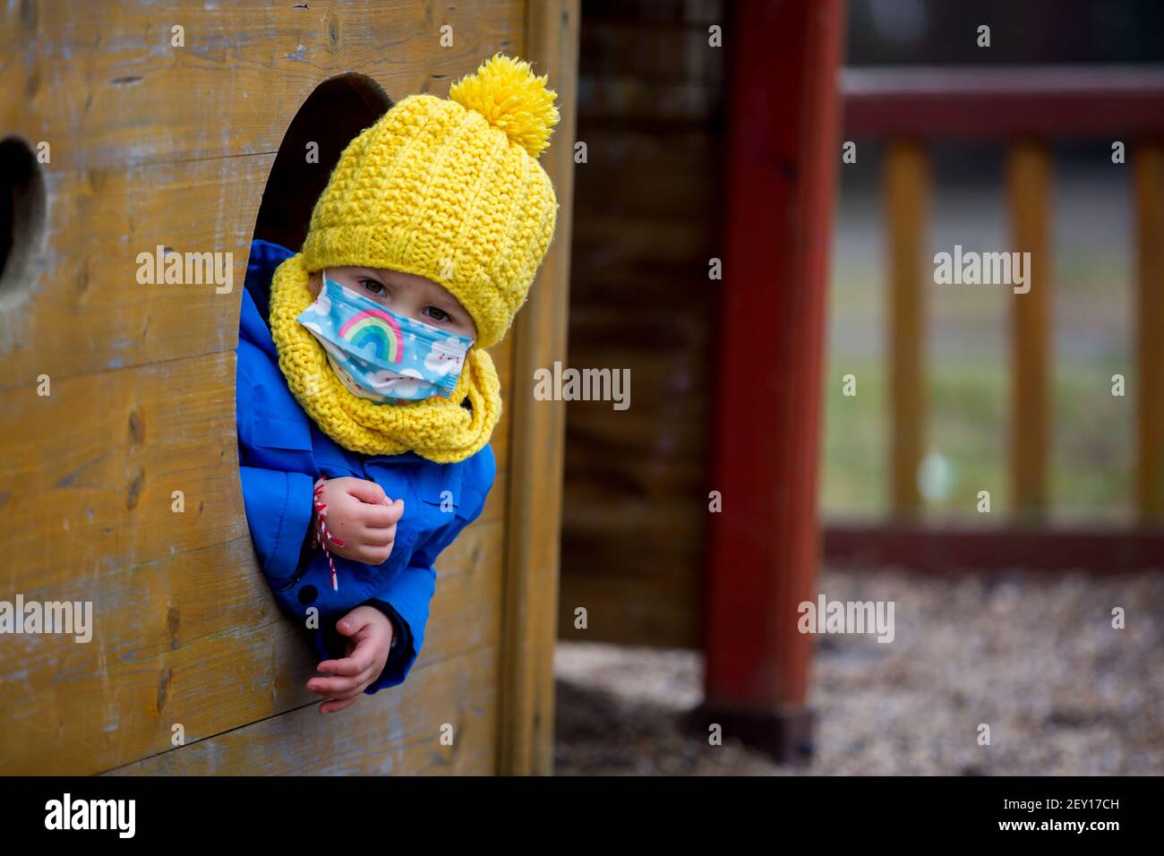 Little toddler child, boy, wearing medical mask while on little walk ...