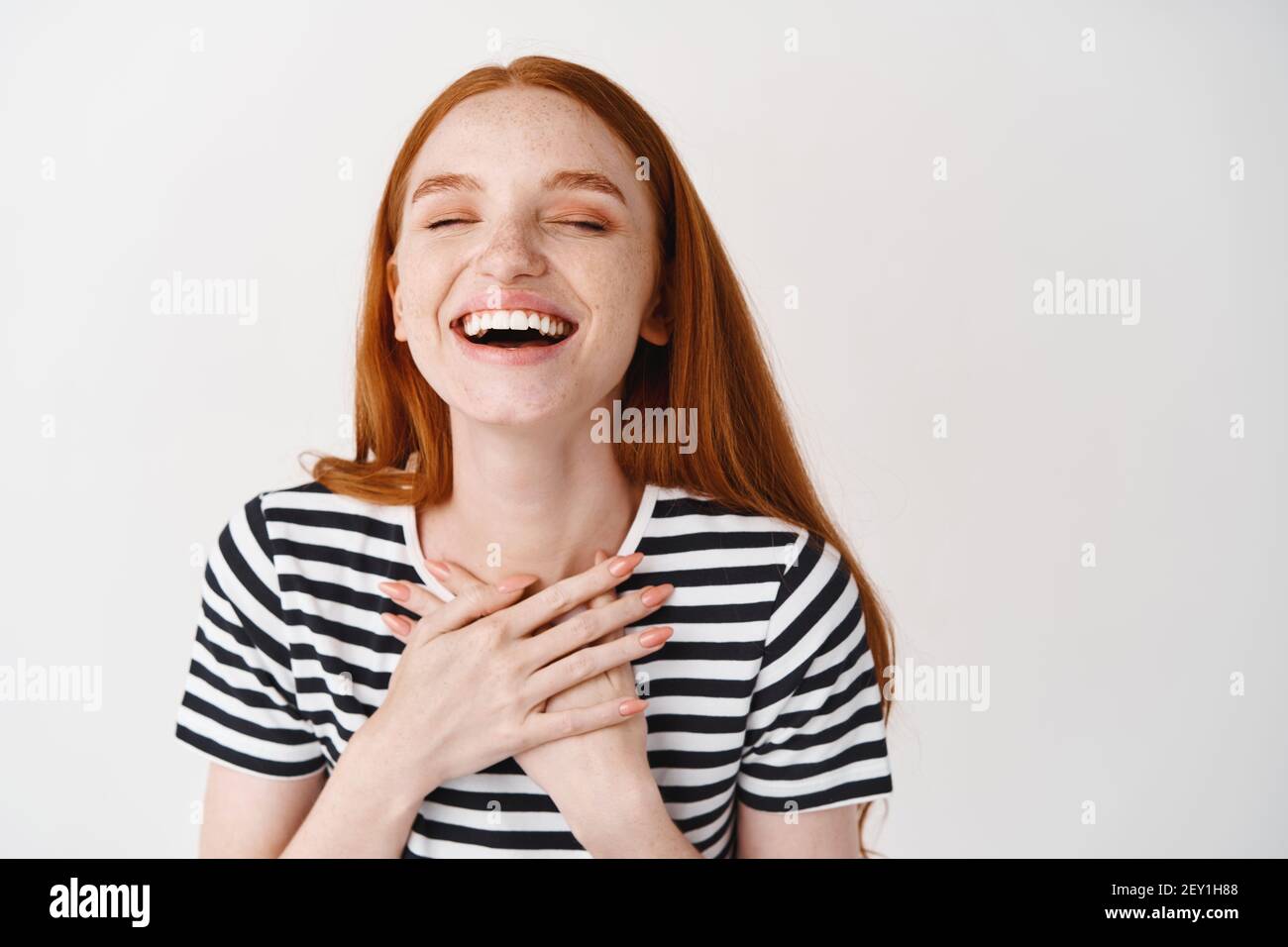Hands on chest laughing hi-res stock photography and images - Alamy