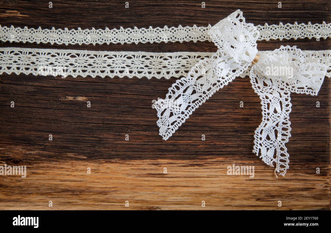 Rustic background with lace Stock Photo - Alamy