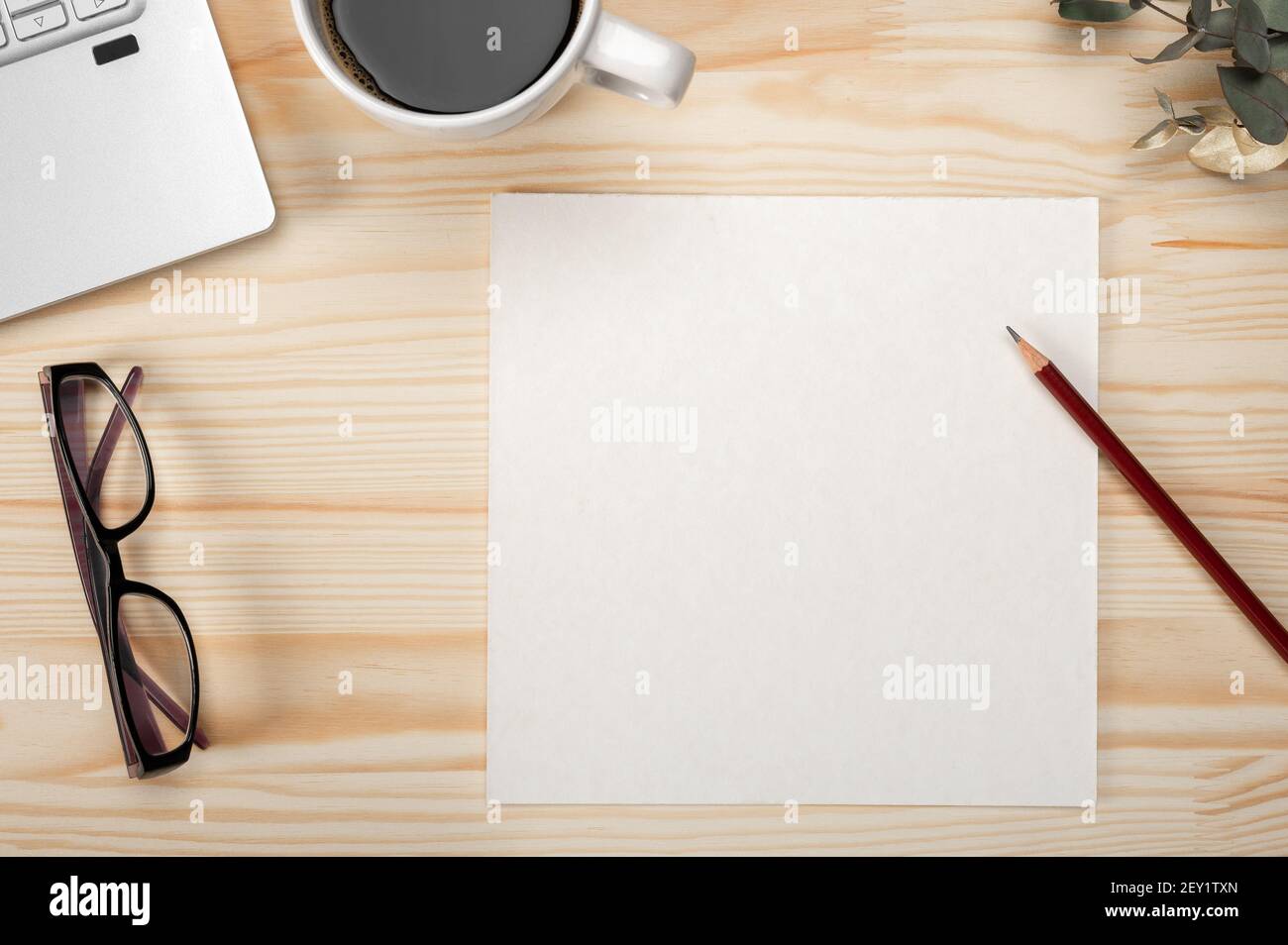 Top view paper card on office desk mockup. Blank paper on wooden desk ...