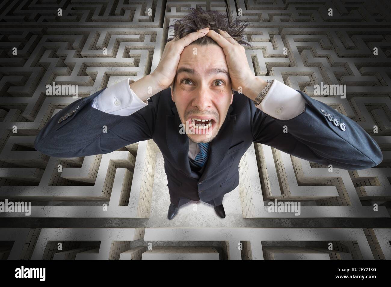 Young man is confused and lost in maze. 3D rendered illustration of ...