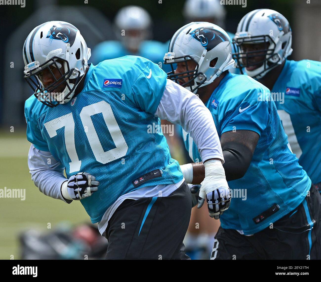 Carolina Panthers guard Trai Turner (70) breaks off a sled during ...