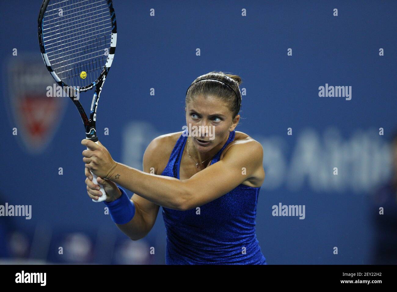 Sara Errani (ITA) competes against Caroline Wozniacki (DNK) on Day 9 ...