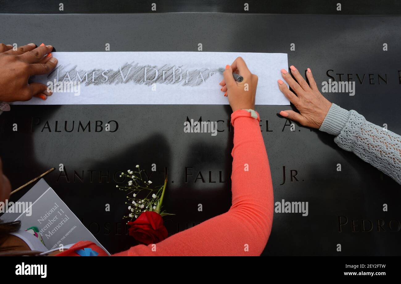 Anthony DeBlase (brother), left, and Anita (mother), right, hold the ...