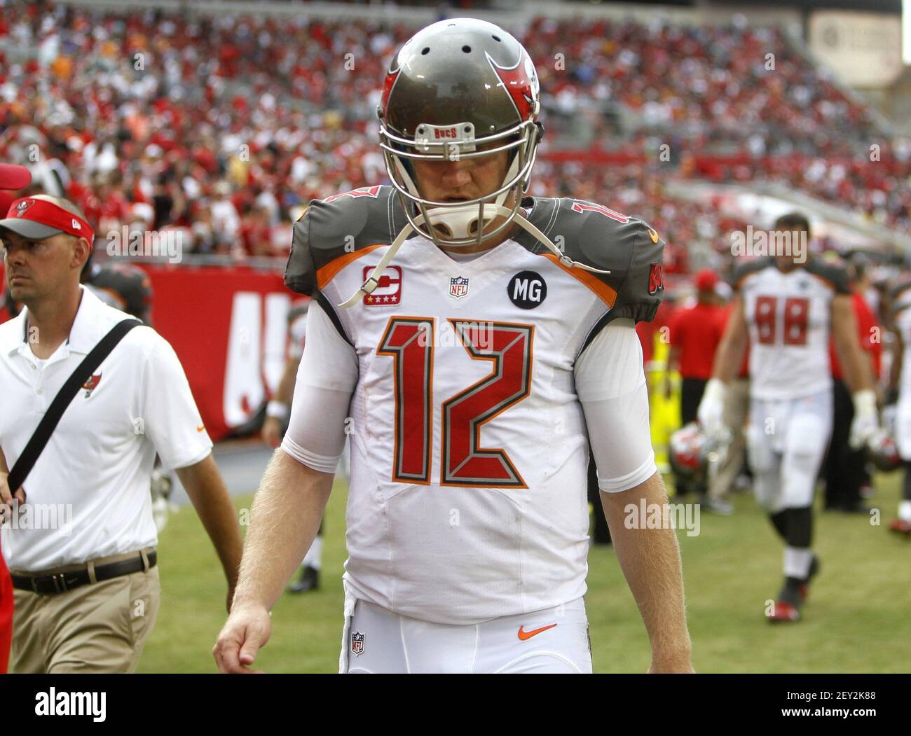 Tampa Bay Buccaneers quarterback Josh McCown (12) lowers his head as he ...
