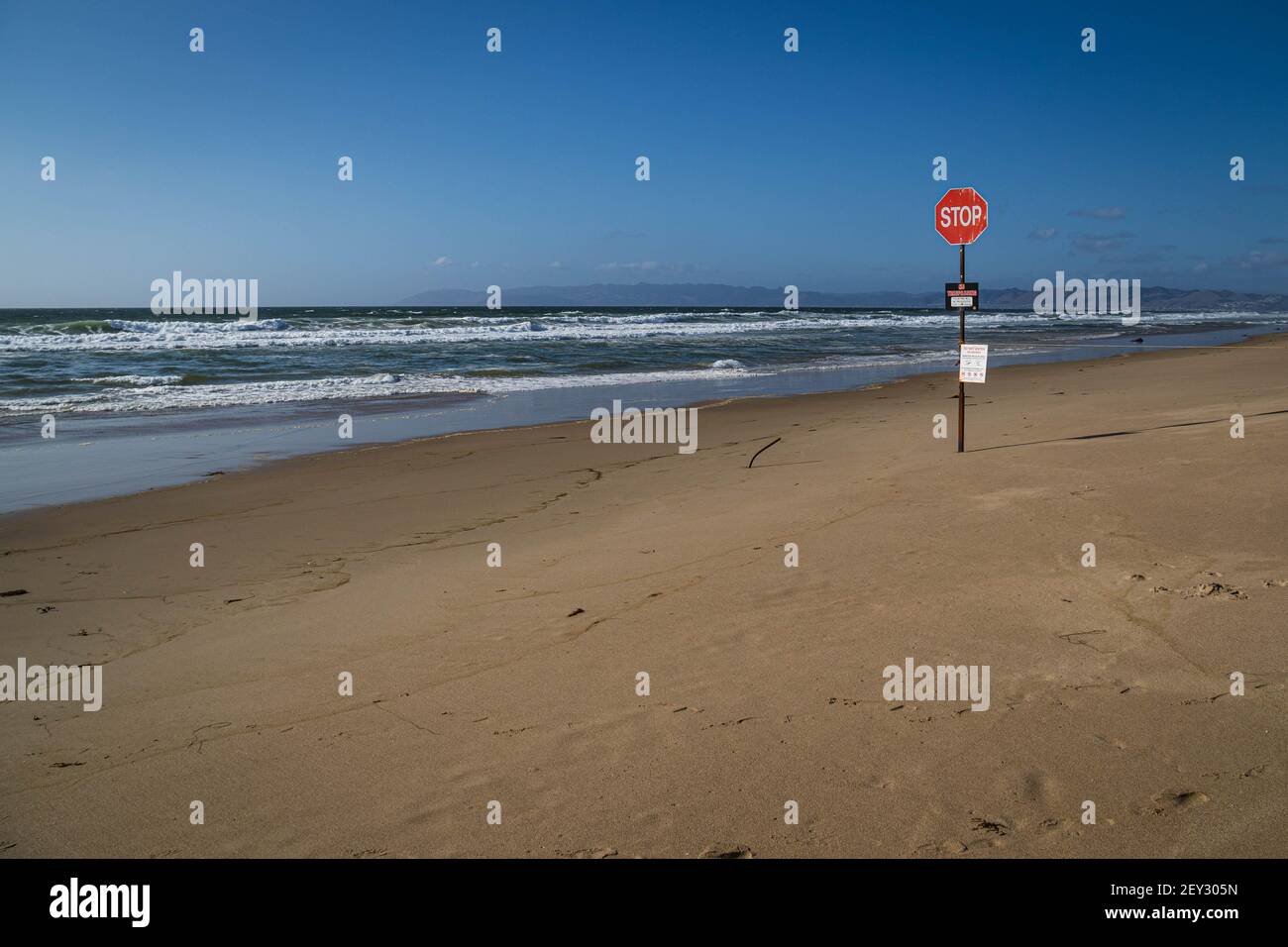 Stop sign on a deserted beach, California Stock Photo - Alamy