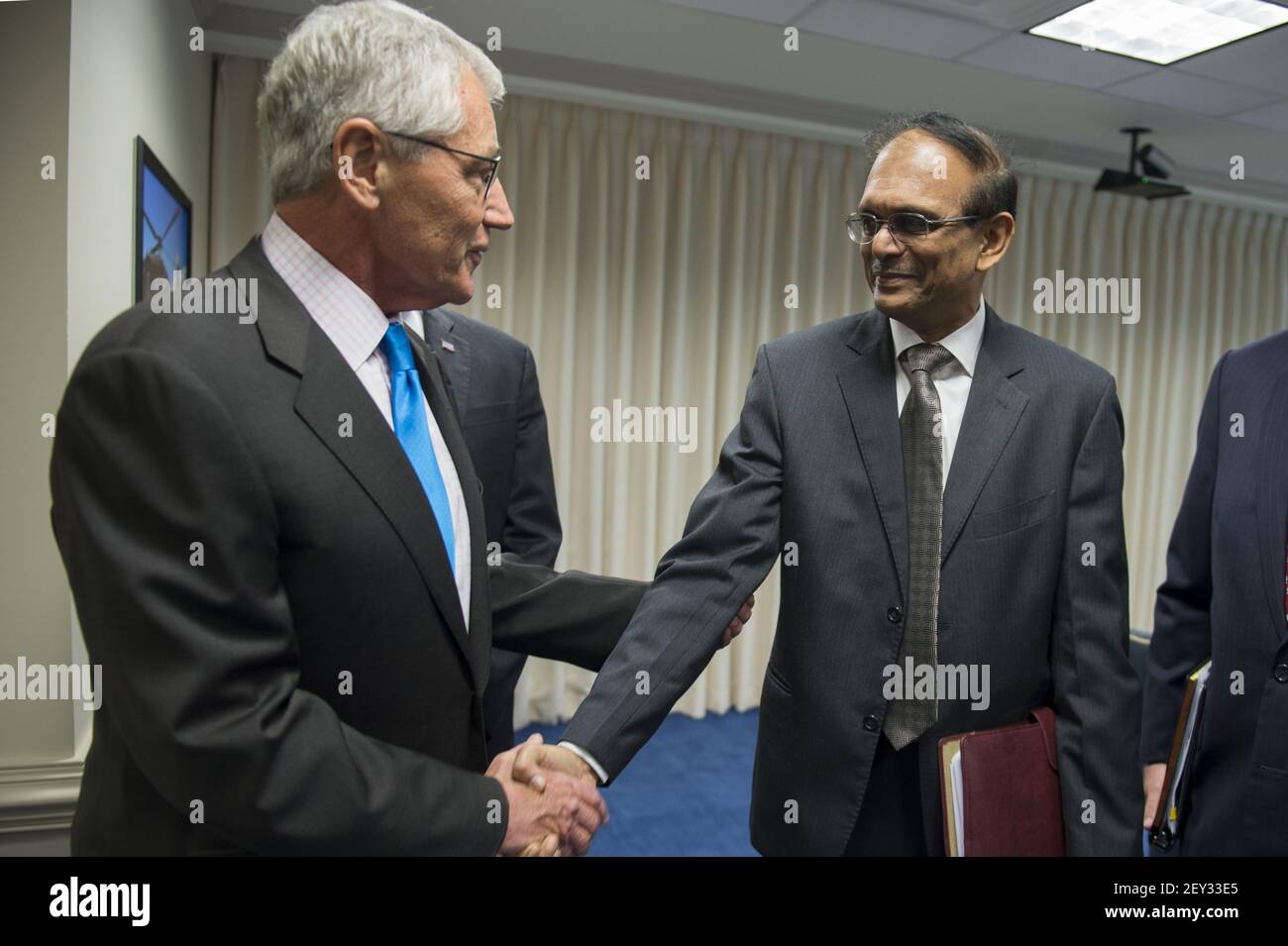 Secretary of Defense Chuck Hagel greets Indian Secretary of Defense ...