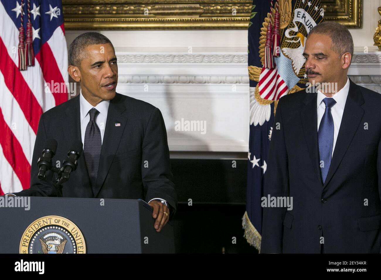 President Barack Obama, left, announces the resignation of Attorney ...