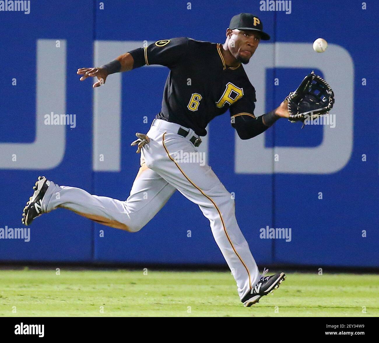 Pittsburgh Pirates' Starling Marte runs down a fly ball by Atlanta ...