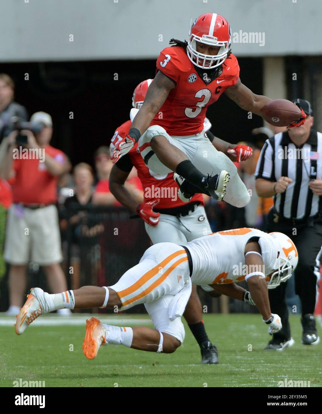 Georgia Bulldogs running back Todd Gurley (3) leaps over Tennessee ...