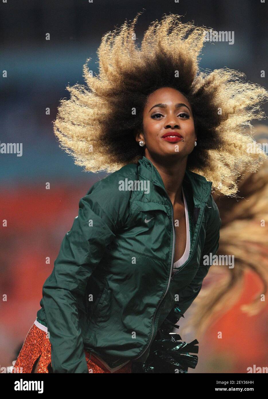 University of Miami cheerleaders perform after a little rain duing a 22 ...