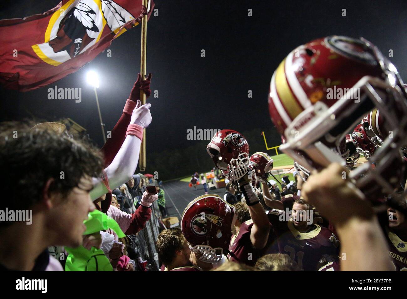 The Morris High School Redskins football team celebrates with their ...