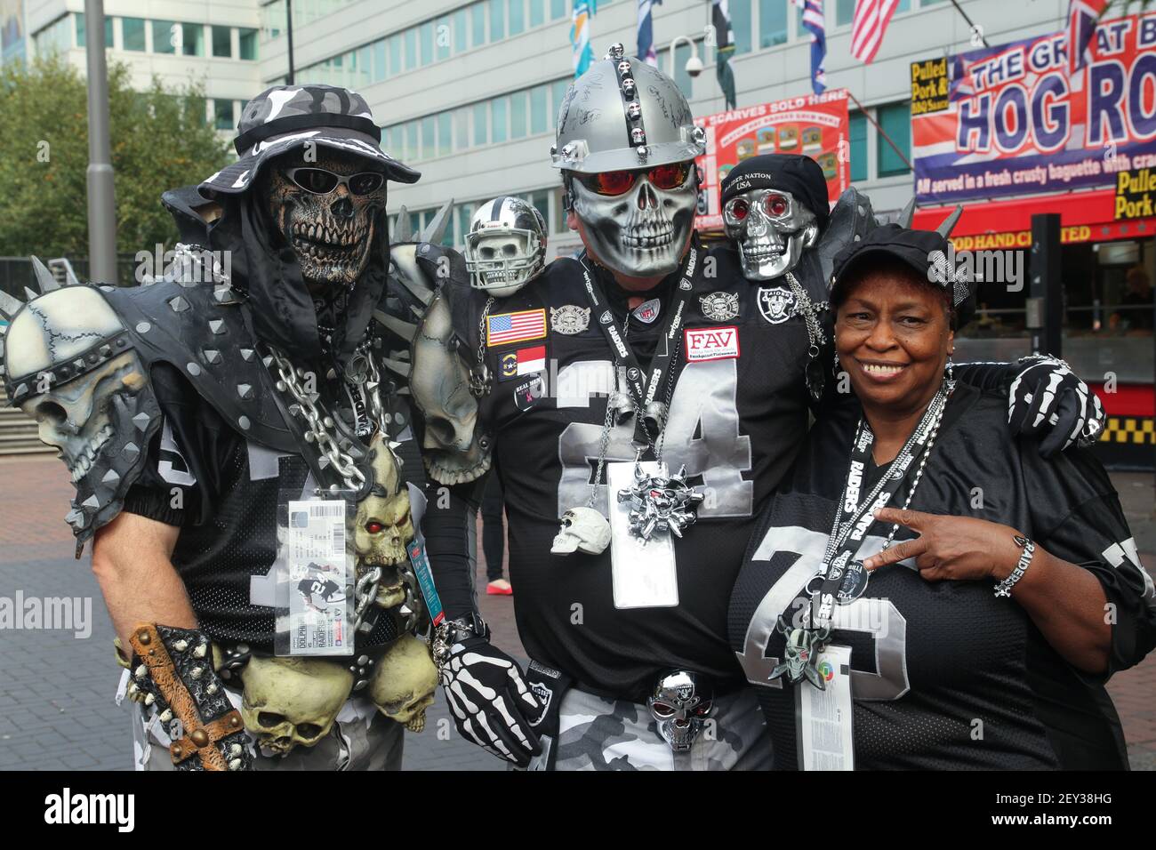 Raiders fans in costume pose for photos at Wembley stadium as thousands ...