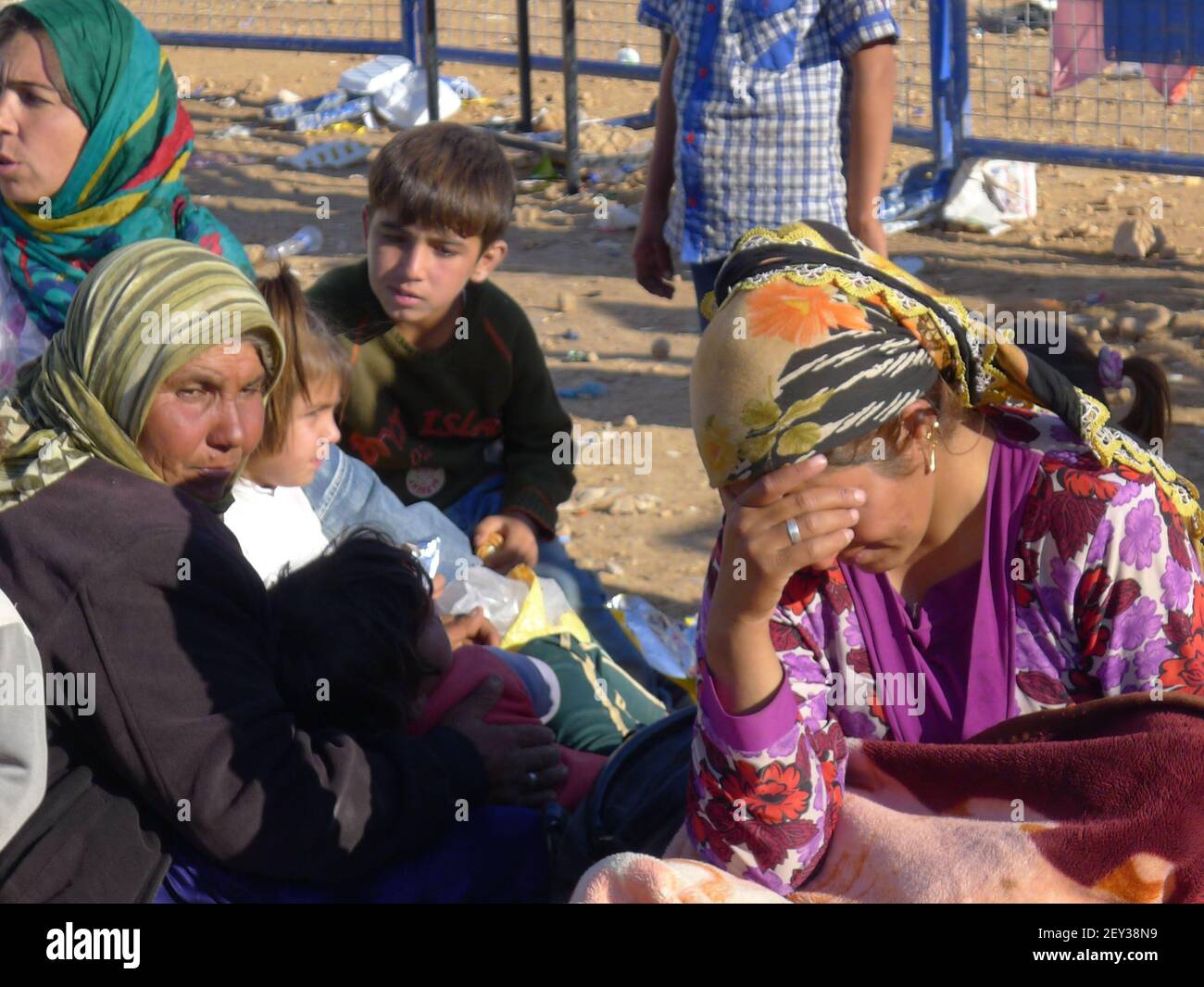 Kurdish refugees arrive in Yumurtalik, Turkey, fleeing the advances of ...