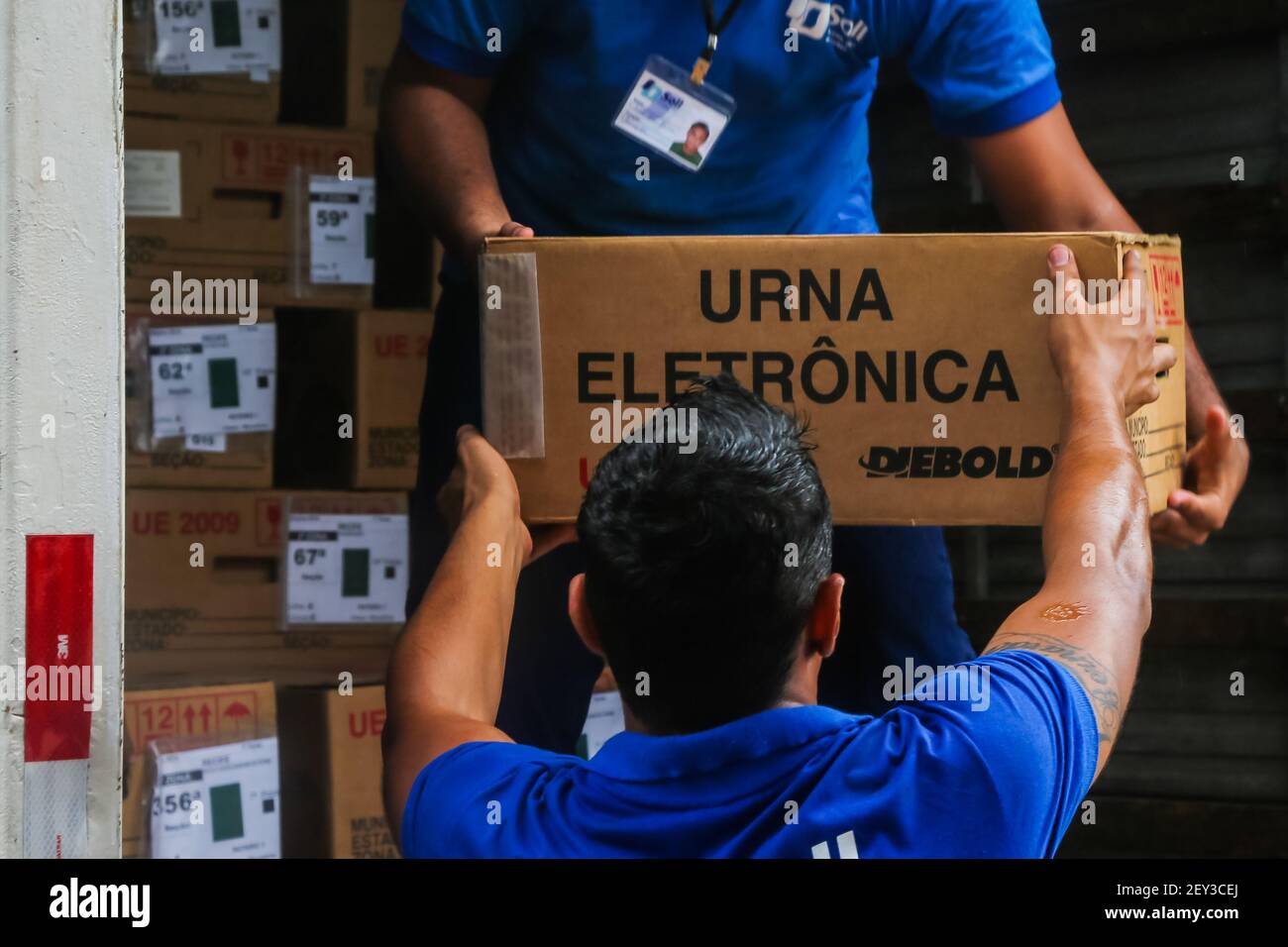 People handing Electronic voting machines in Recife, on October 2, 2014 ...