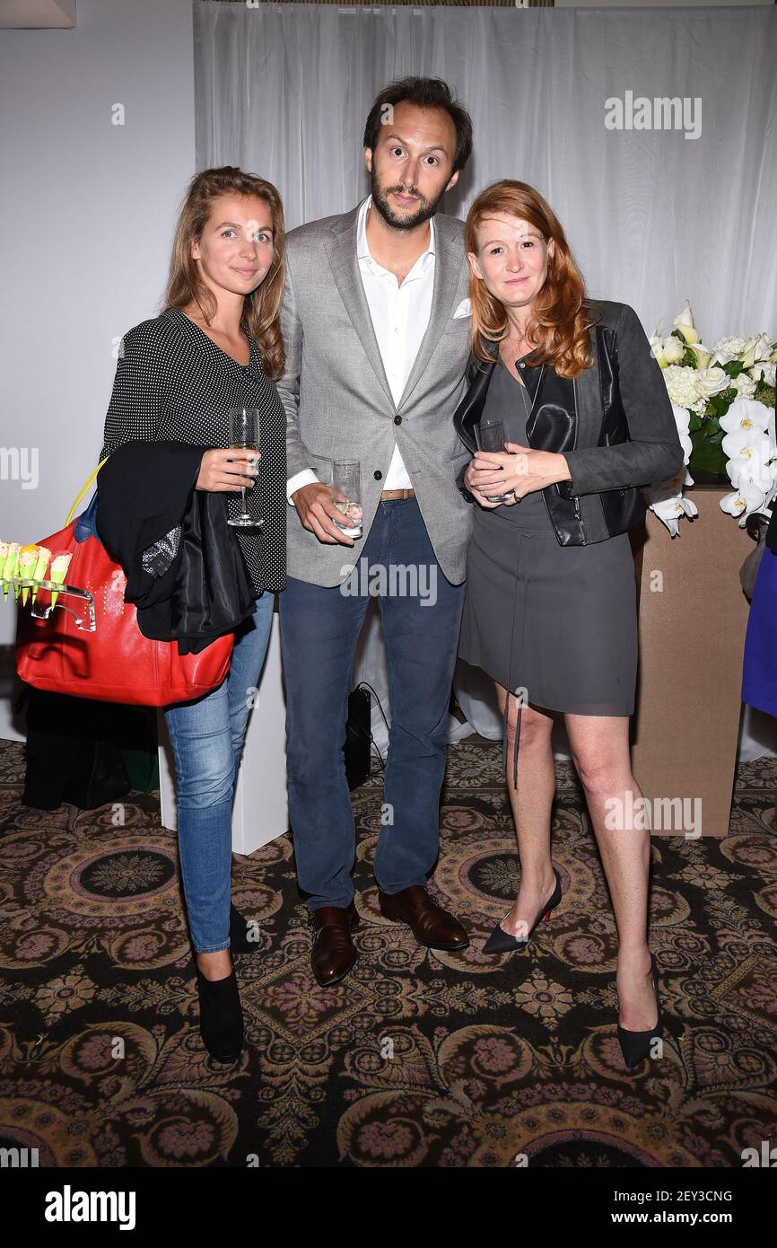 (L-R) Maylis Vranken, Thierry Stanislas and Agnes de Villarson attend ...
