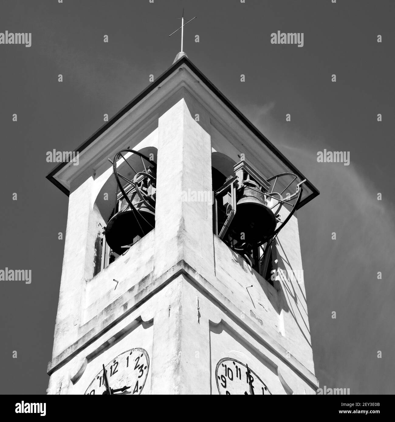 Monument clock tower in italy europe old stone and bell Stock Photo - Alamy