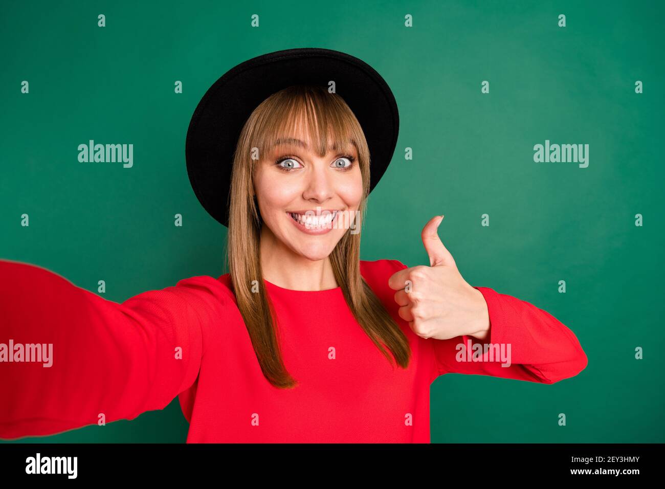 Photo of young happy smiling excited crazy girl take selfie showing ...
