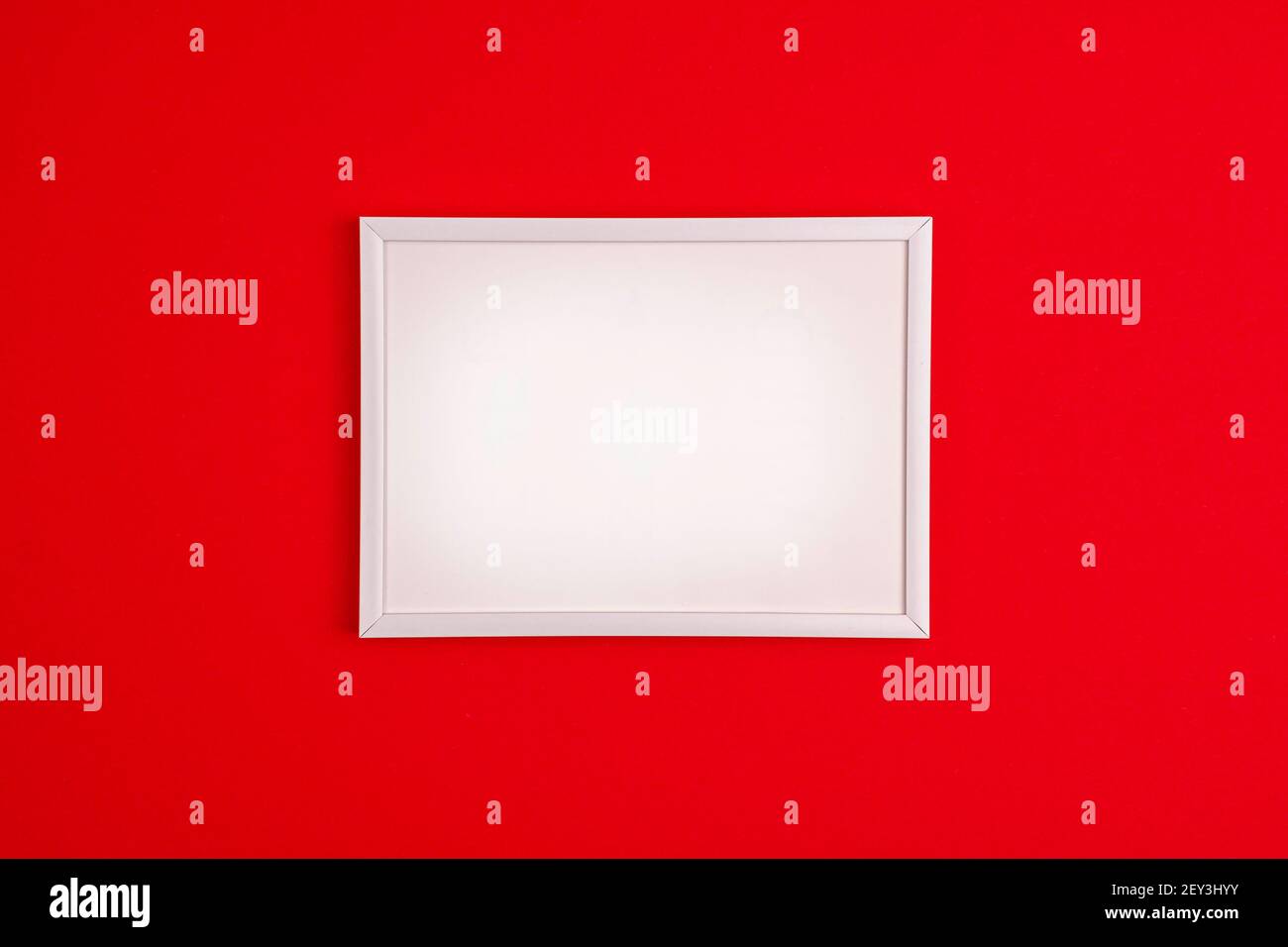 Mockup white frame flat lay on vibrant red background. Mothers day ...